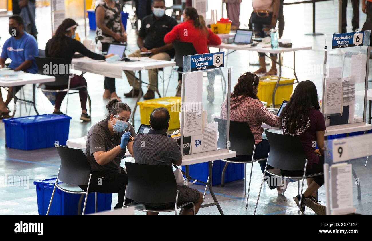Brampton, Canada. 10th July, 2021. People get vaccinated at a ...