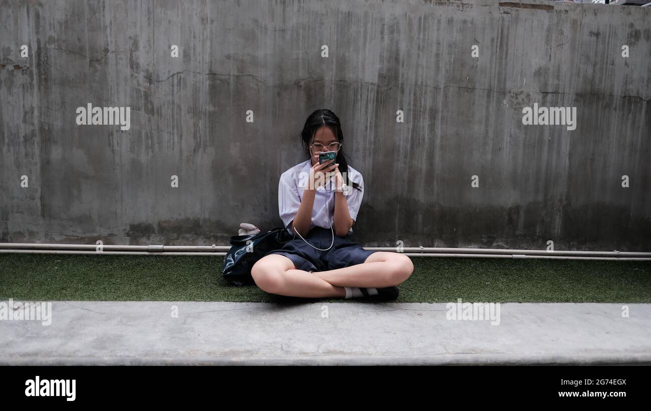 Girl Sitting Alone In School