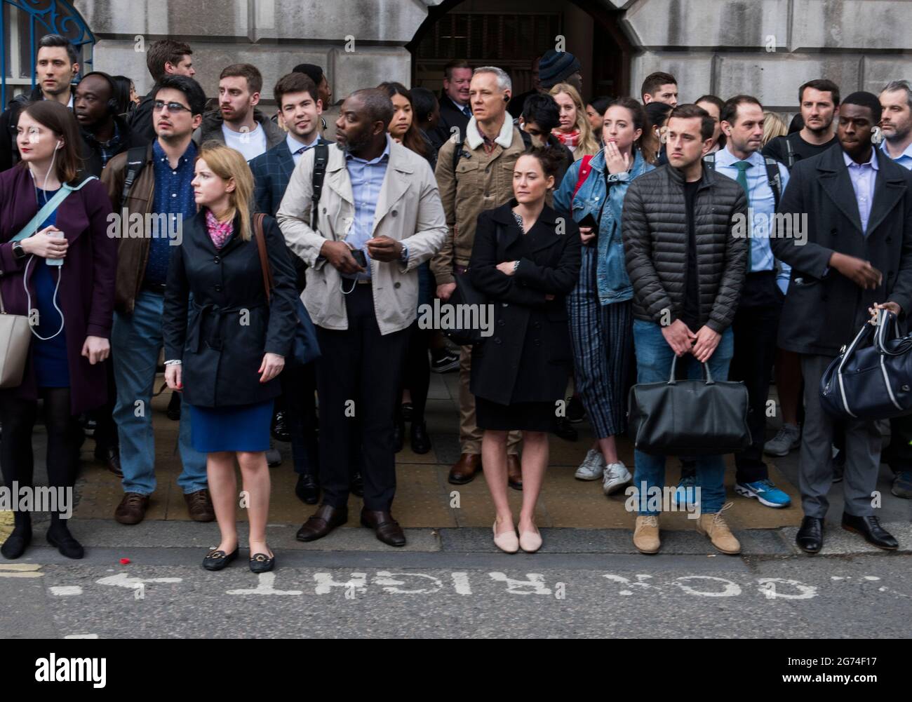 Office workers navigating the Extinction Rebellion protests in the ...