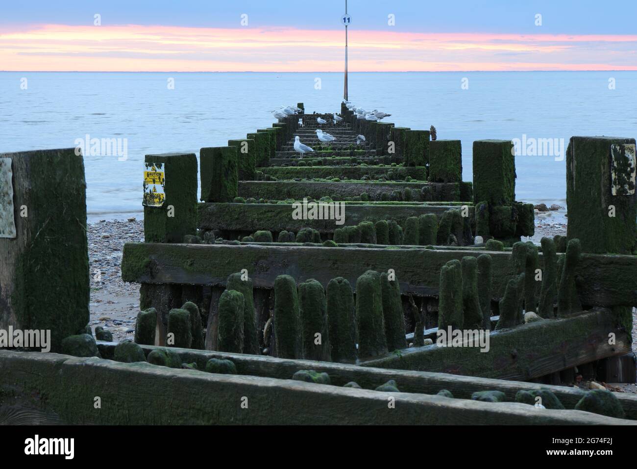Sea defences or groynes along the beach in Hunstanton, a Norfolk ...