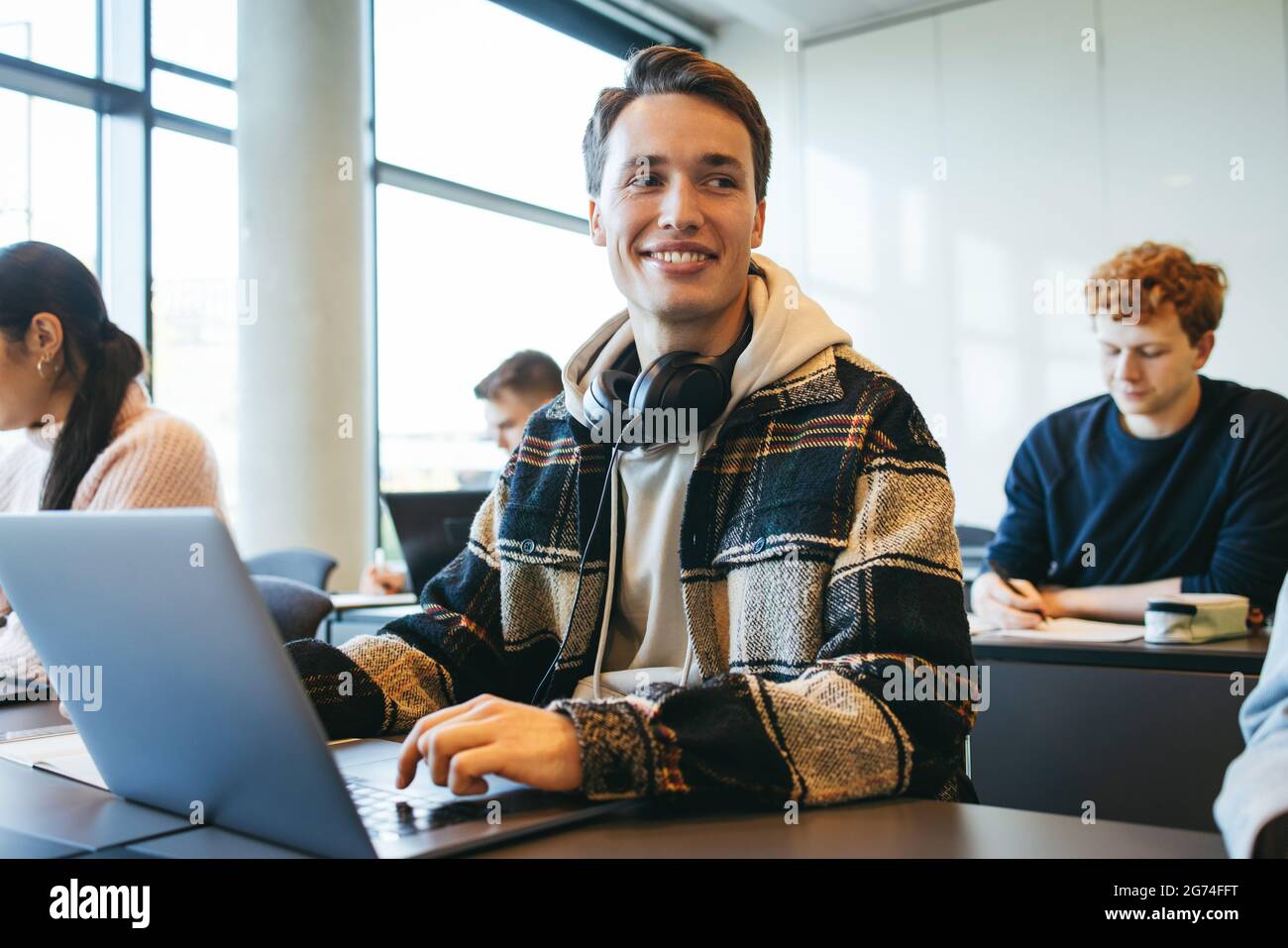 Student standing classroom hi-res stock photography and images - Alamy