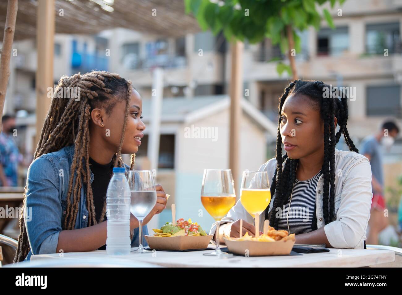Talkative women hi-res stock photography and images - Alamy