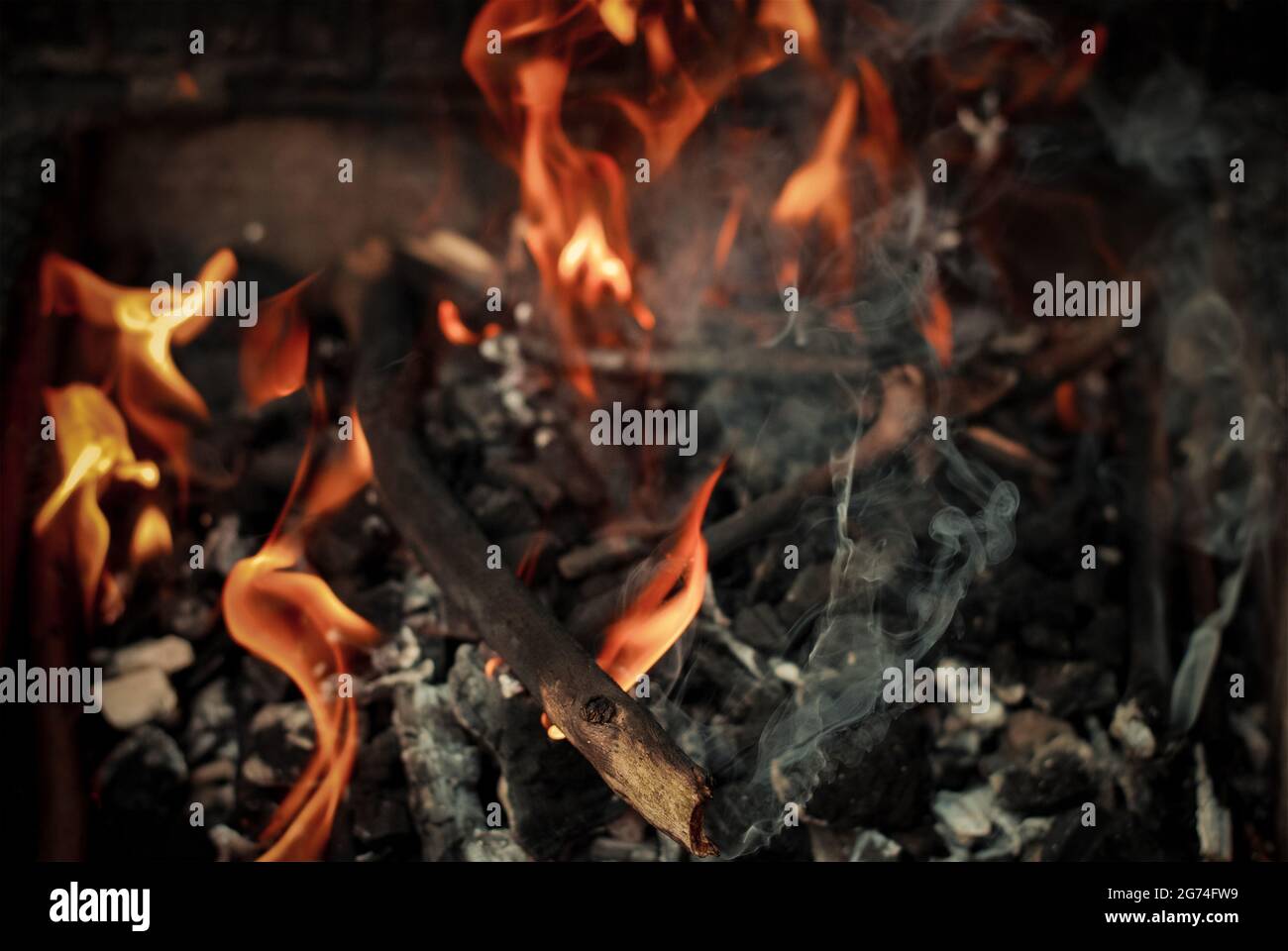 A closeup of embers from a barbecue, fire, and ash Stock Photo - Alamy