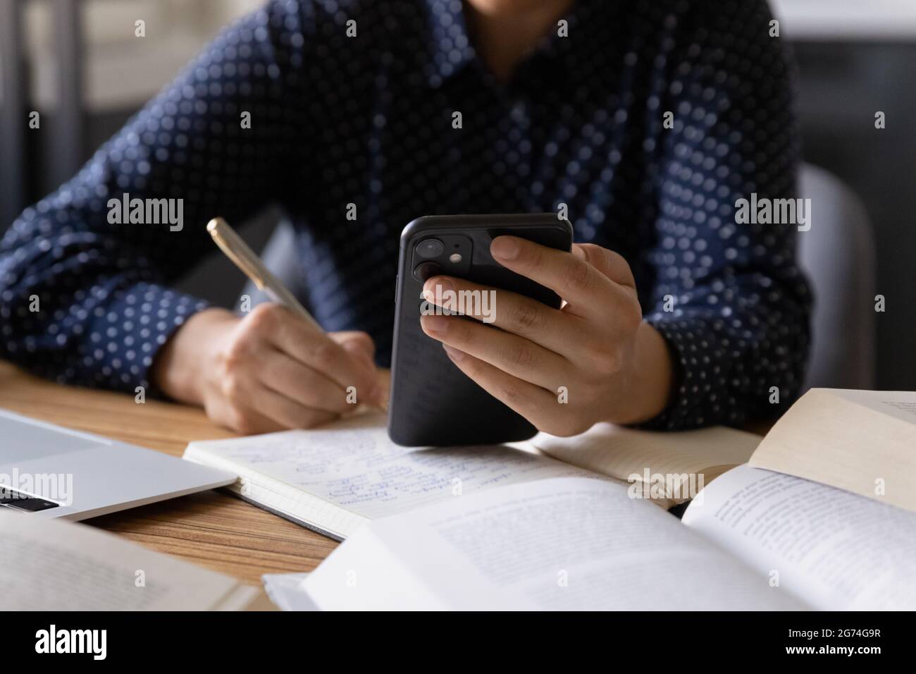 Female student using online learning app on smartphone Stock Photo - Alamy