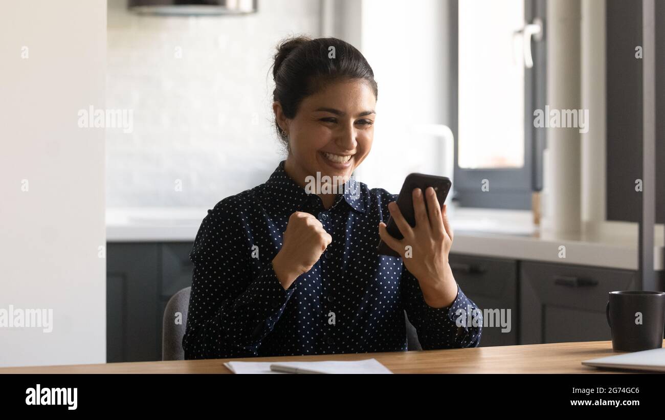 Happy excited woman receiving good amazing news Stock Photo - Alamy
