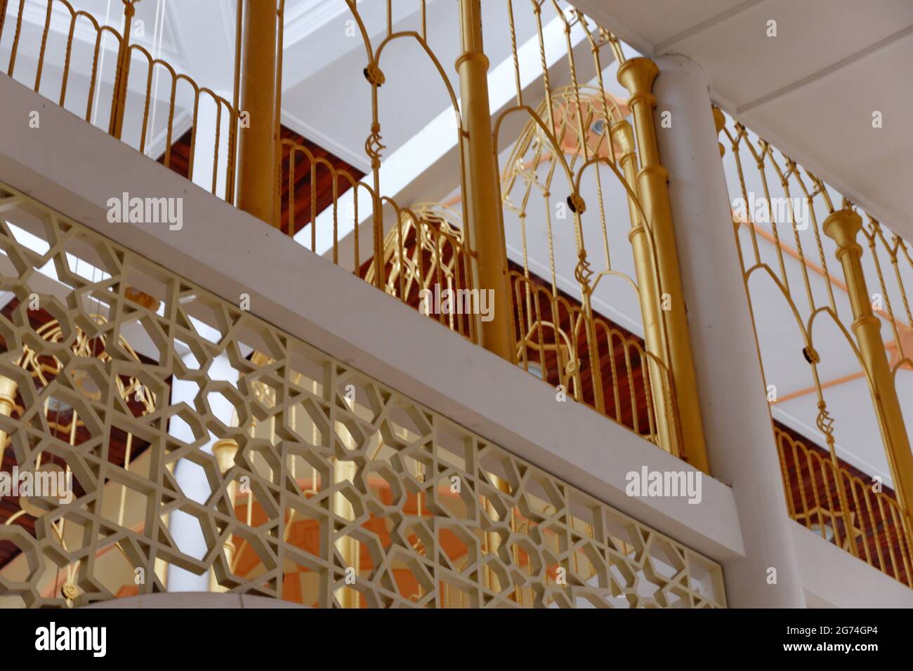 A beautiful indoor balcony design with wrought iron railings Stock ...