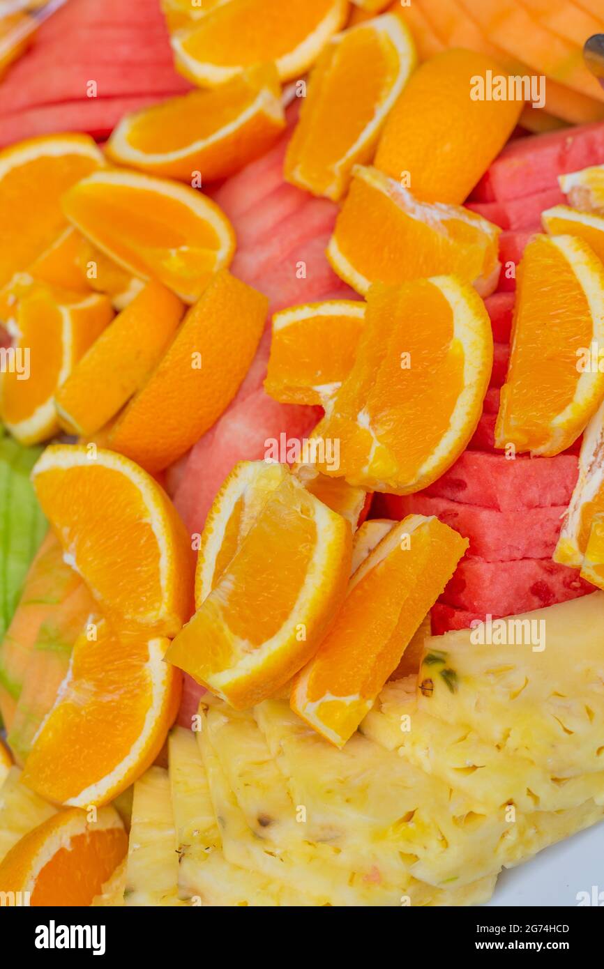 A vertical closeup shot of sliced fresh fruits Stock Photo - Alamy