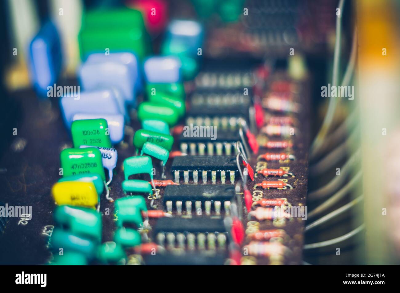 Vintage electronic circuit boards with radio parts and chips, close-up ...