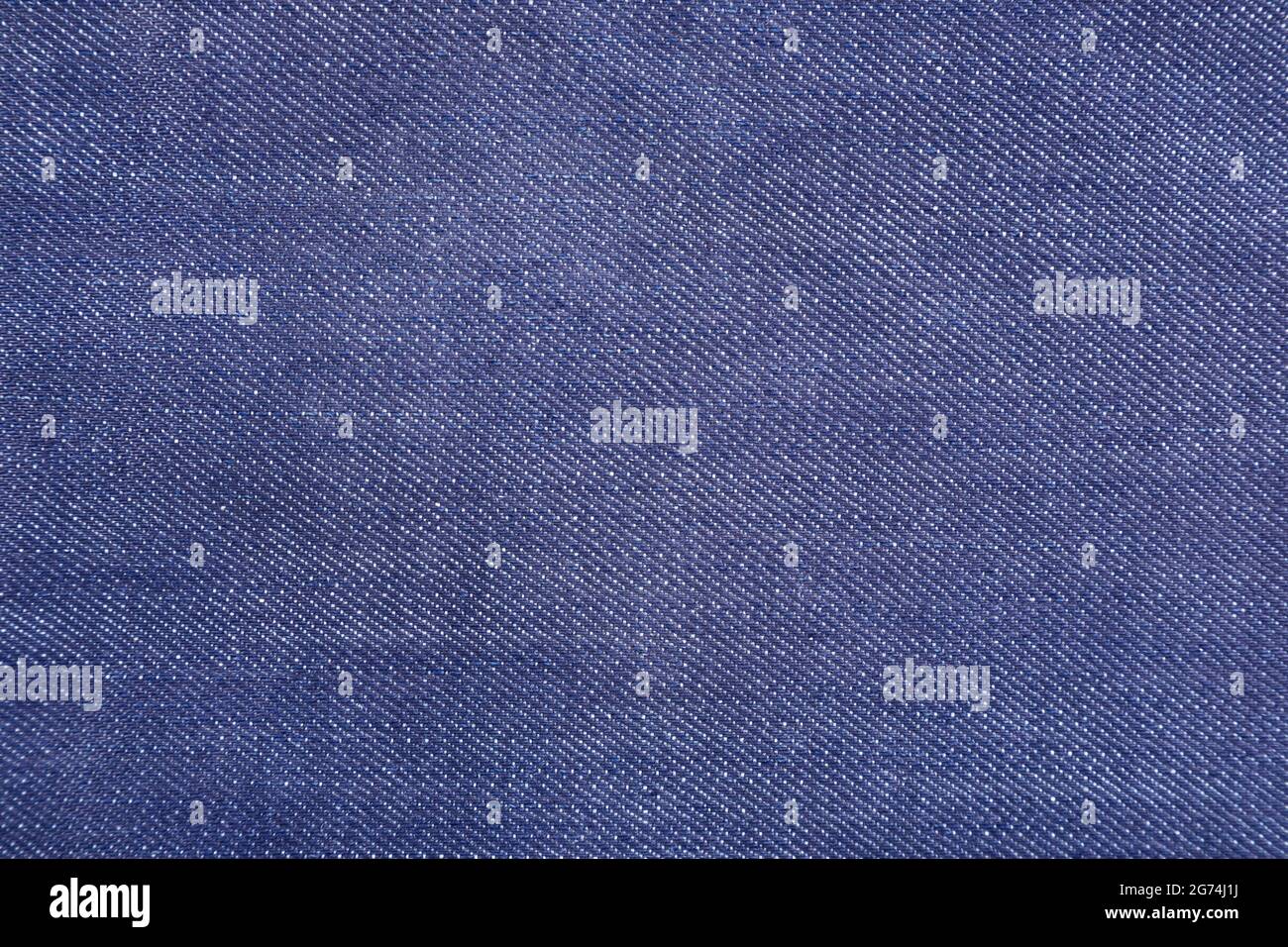 Blue jeans abstract textured background Stock Photo - Alamy