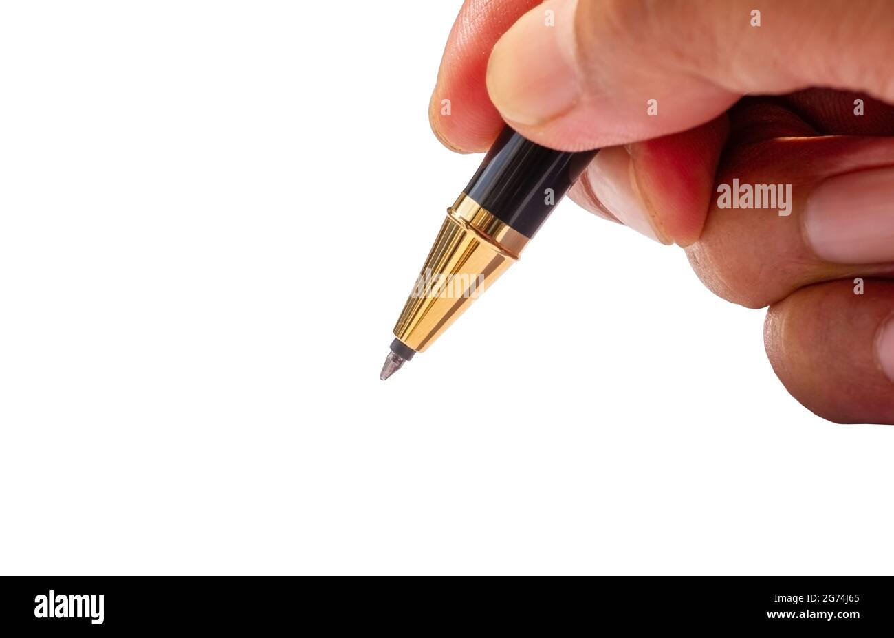 Writing with a gold pen, in shallow focus, isolated on white background ...