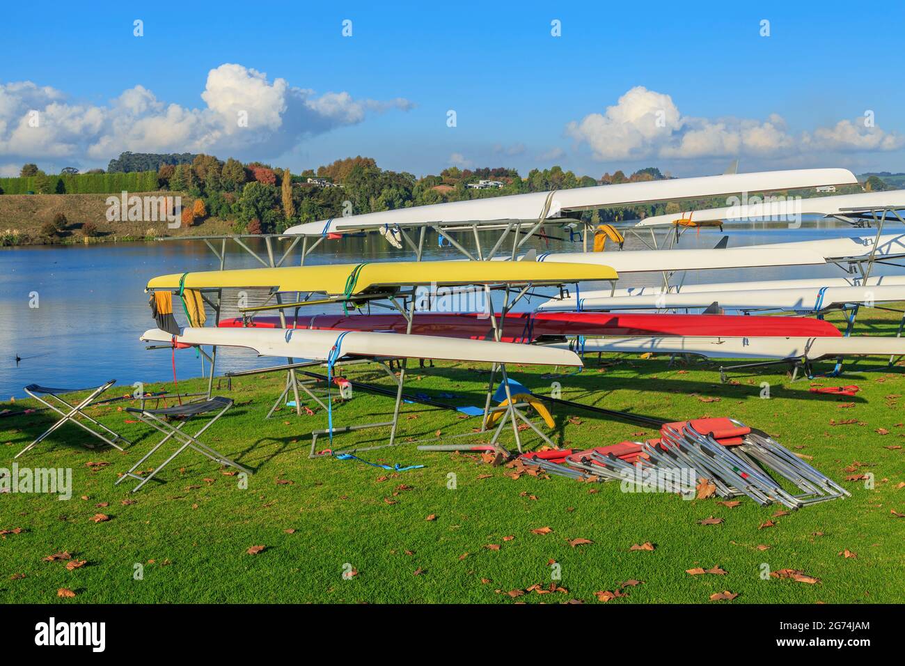 Racing boats on the shore of Lake Karapiro, New Zealand, one of the ...