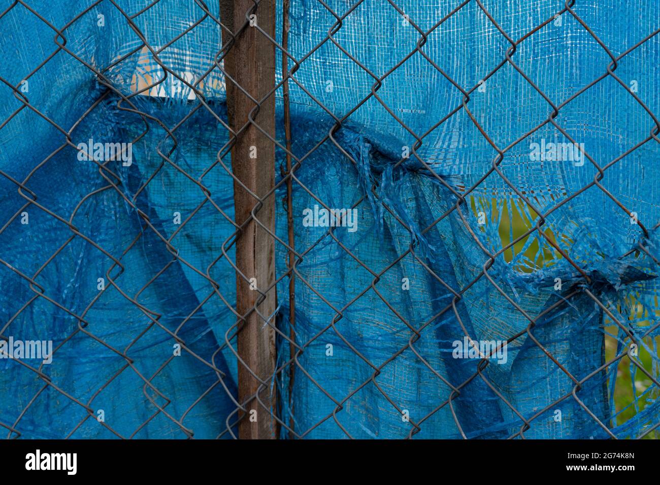 background in the form of a netting mesh and blue fabric Stock Photo ...