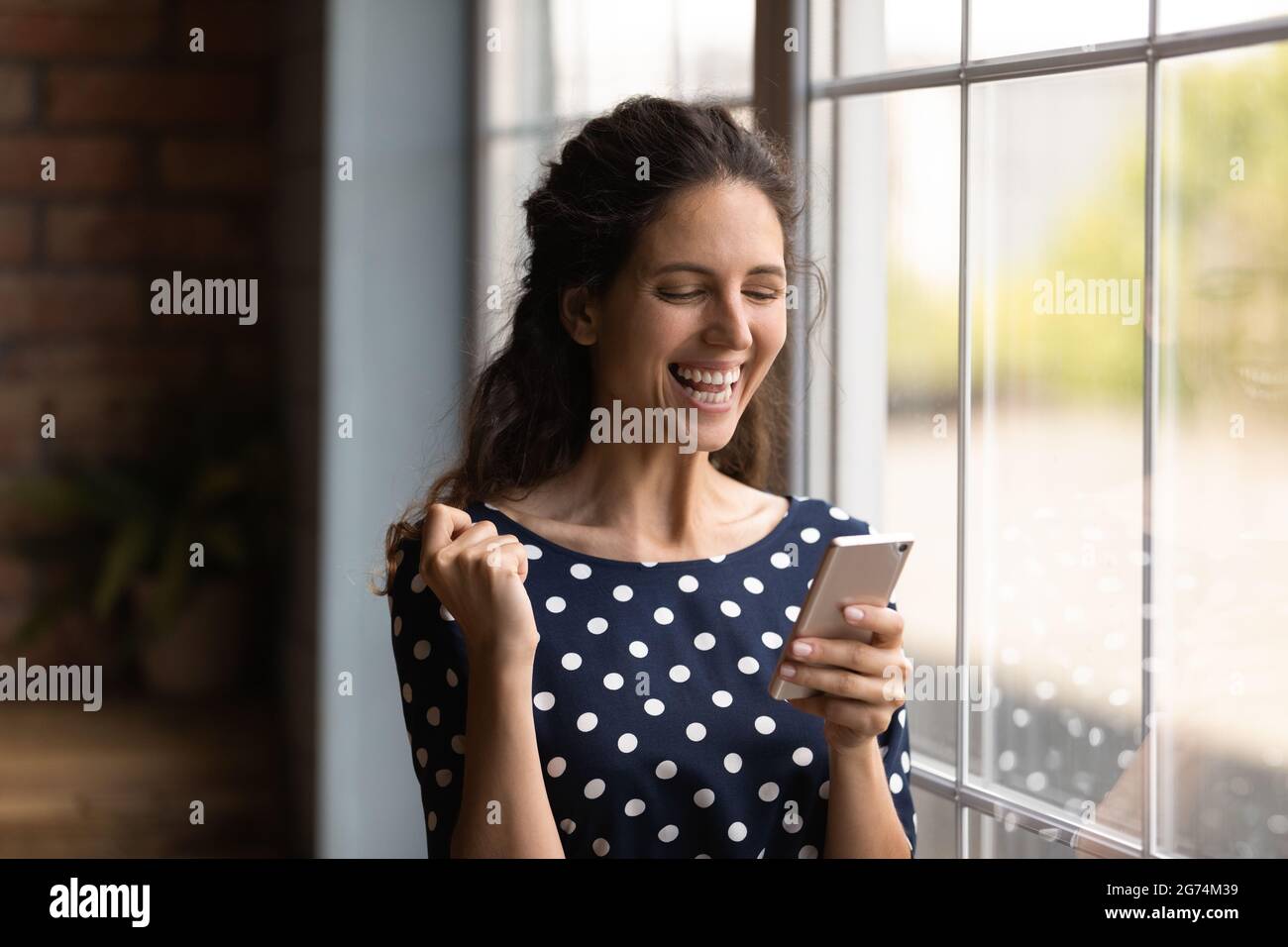 Excited young woman getting hi-res stock photography and images - Alamy
