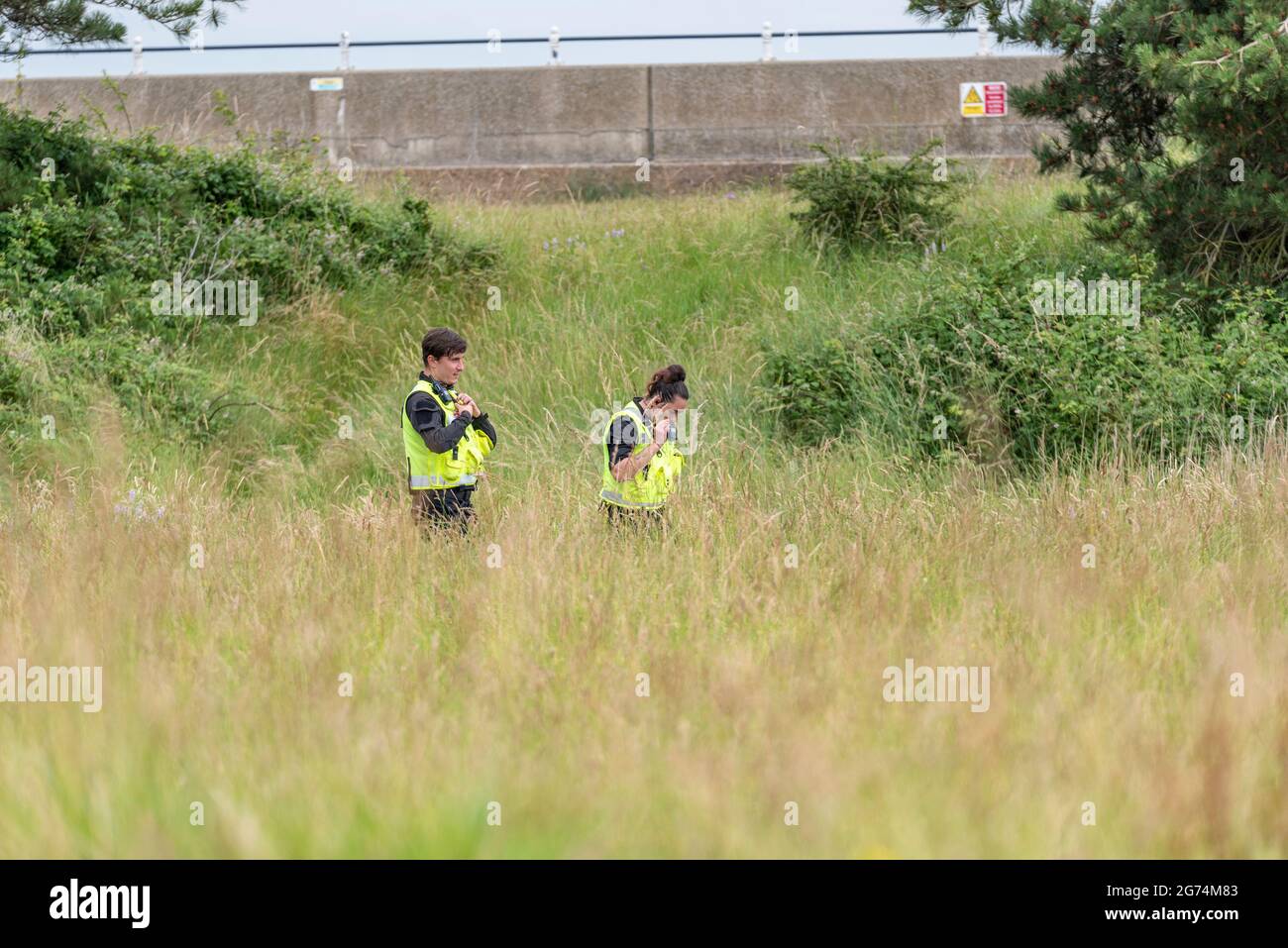 Rural policing concept as police officers patrol in Gunners Park in ...