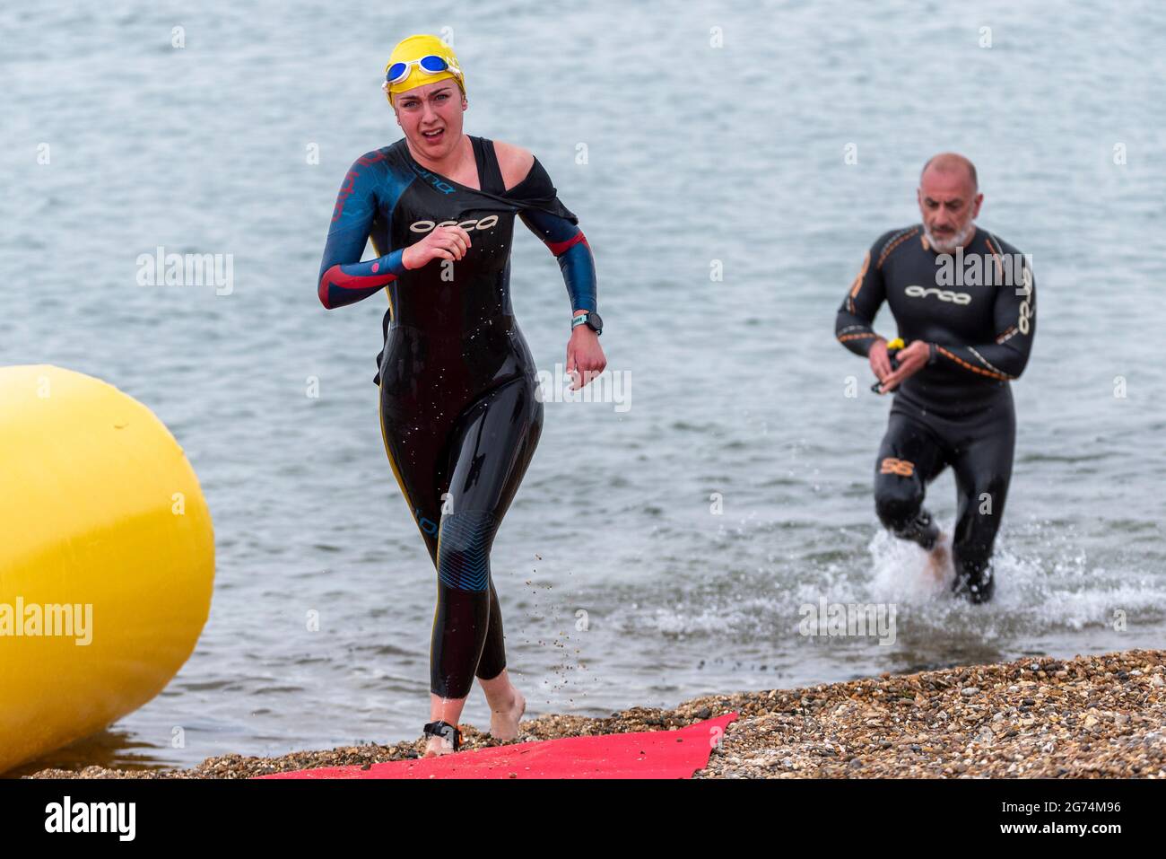 Triathletes competing in the Southend Triathlon 2021 in Shoeburyness ...