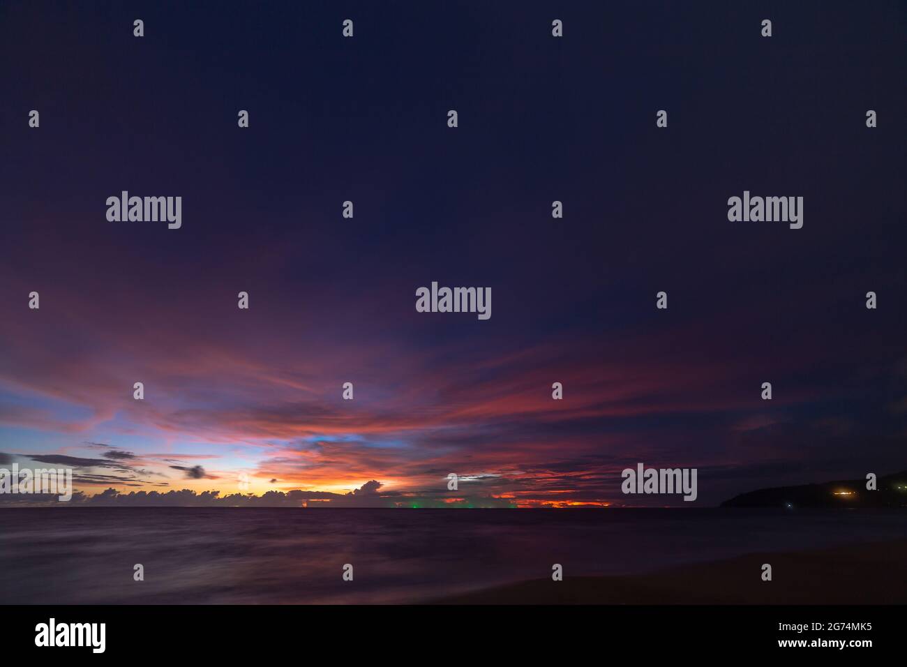 stunning sunset at the sea in twilight. Scene of colorful red light ...