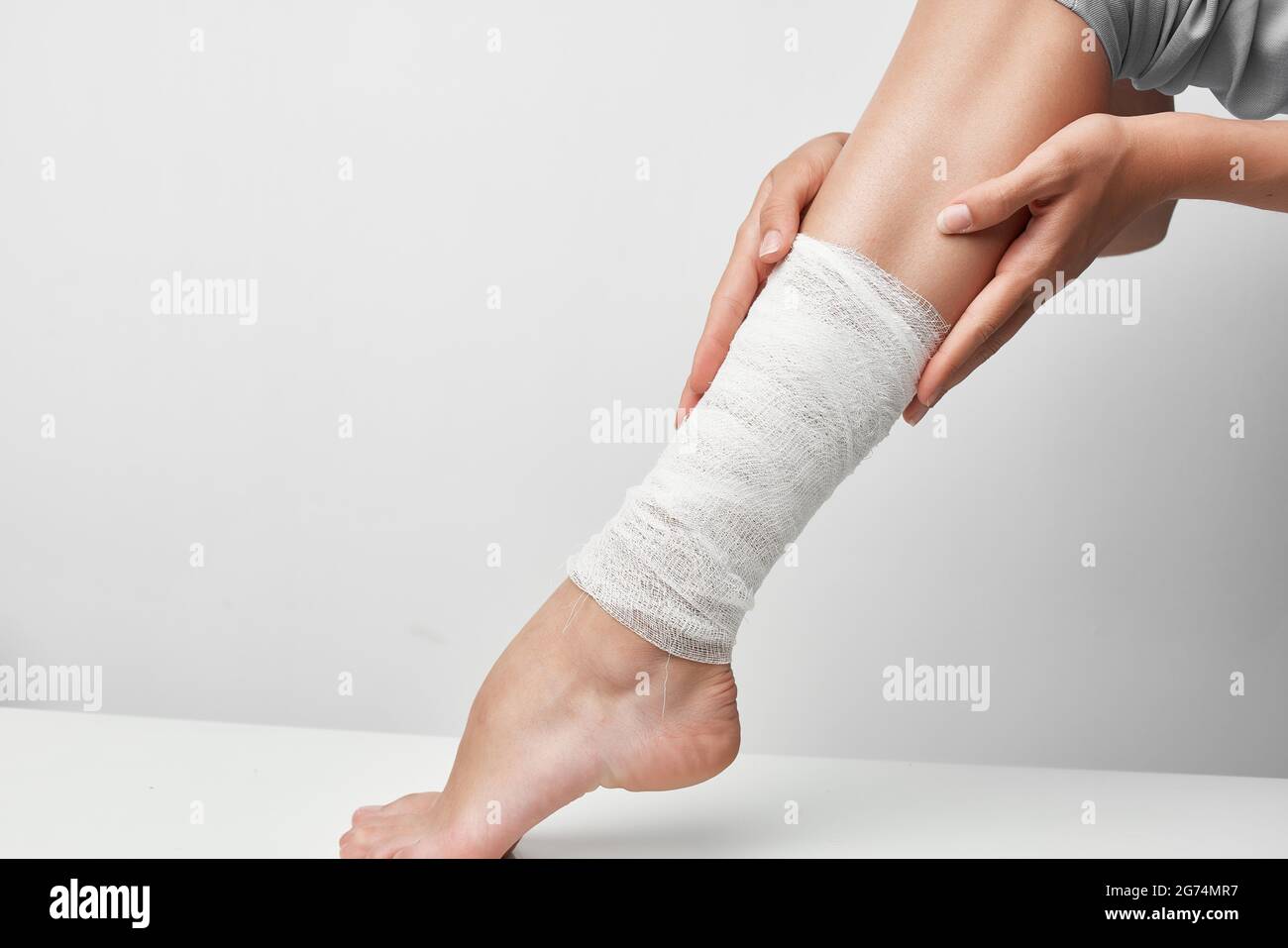 bandaged leg injury health treatment lifestyle Stock Photo - Alamy
