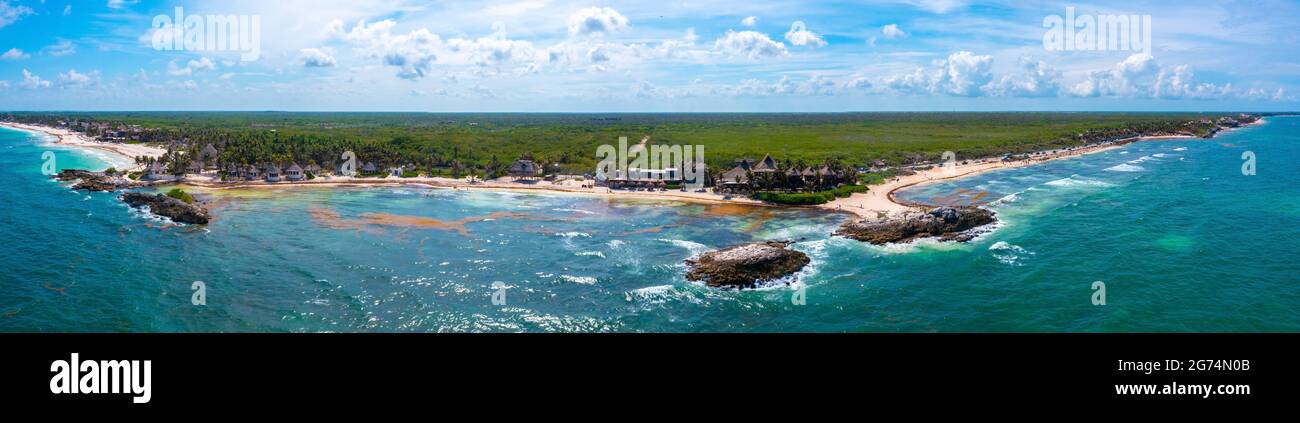 Aerial Tulum coastline by the beach with a magical Caribbean sea and ...