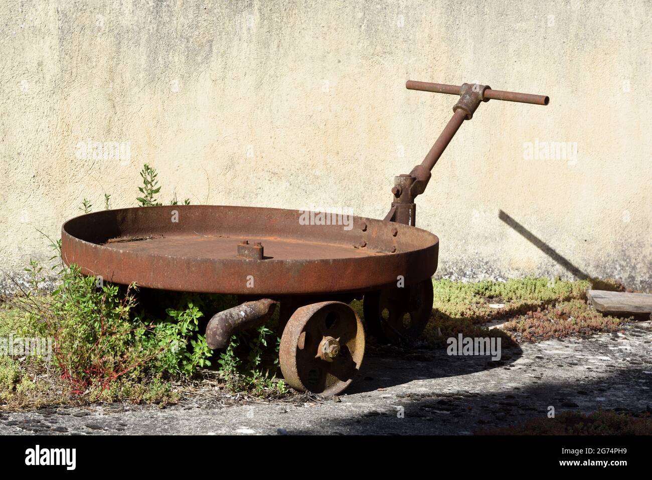 Round Metal Vintage Hand Cart or Hand Trolley Stock Photo - Alamy