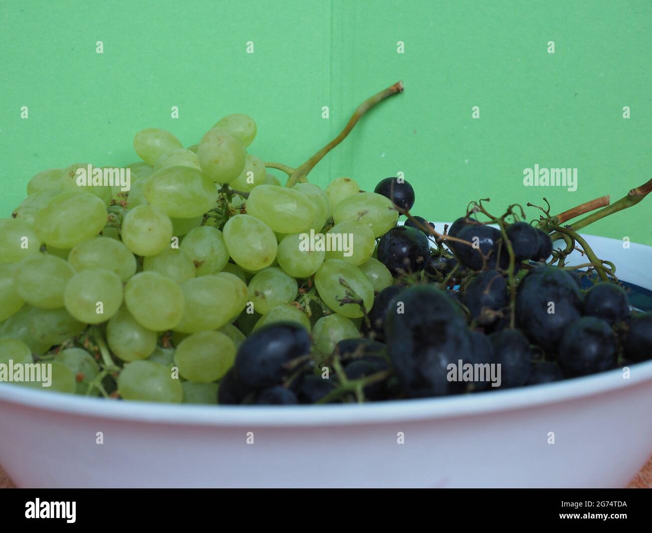 white and red grape (scientific name Vitis vinifera) vegetarian fruit ...