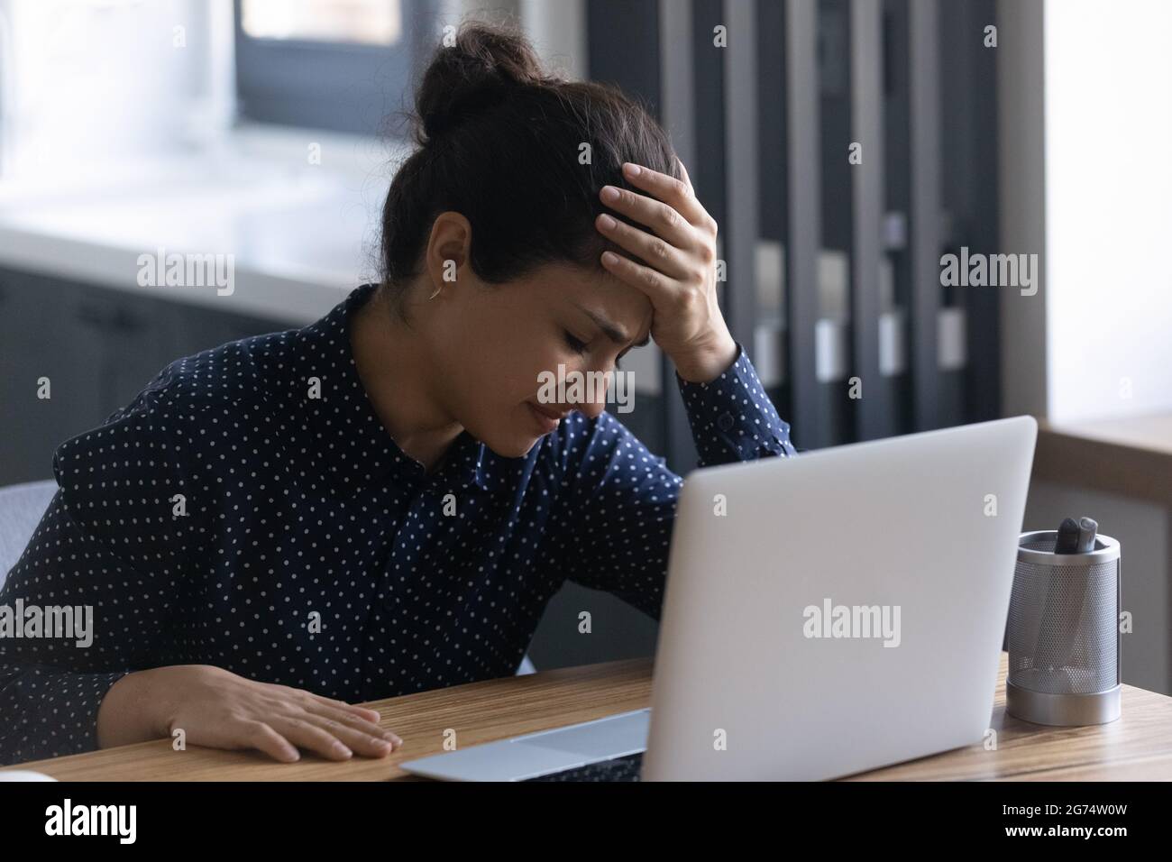 Unhappy Indian female employee upset about her mistake or problem Stock ...