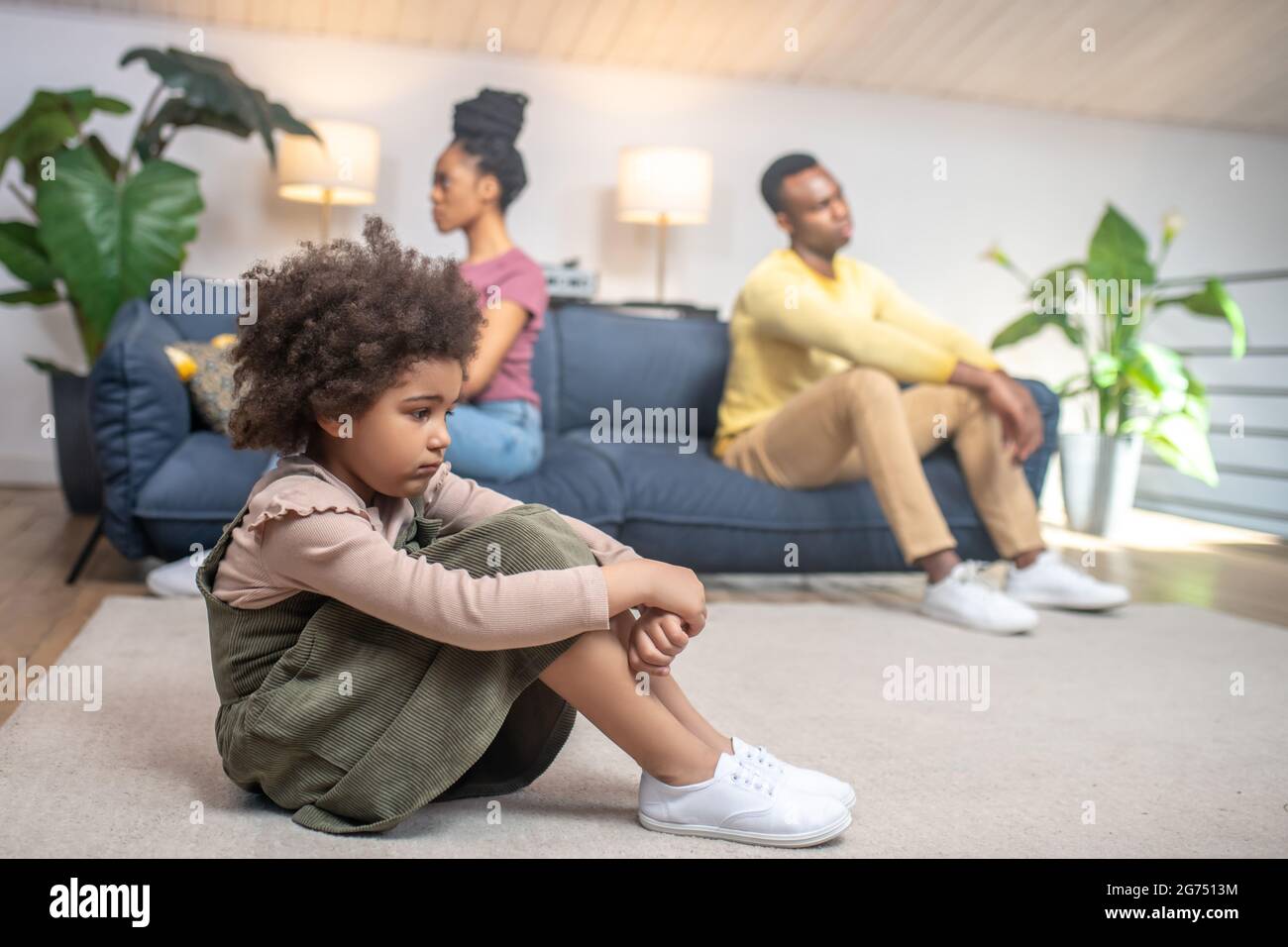 Unhappy daughter with parents hi-res stock photography and images - Alamy