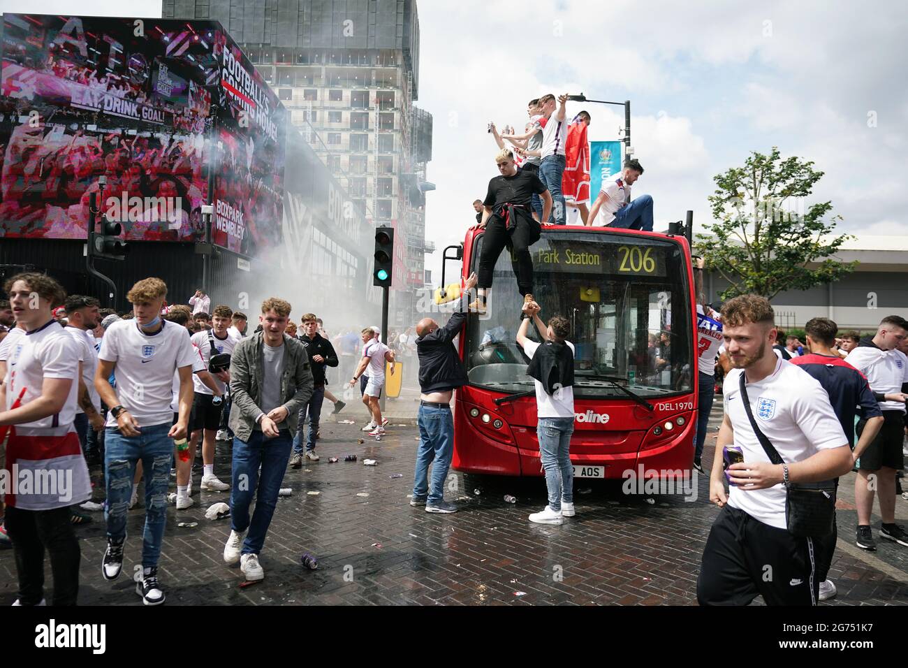 England fans climb aboard a bus outside the ground ahead of the UEFA ...