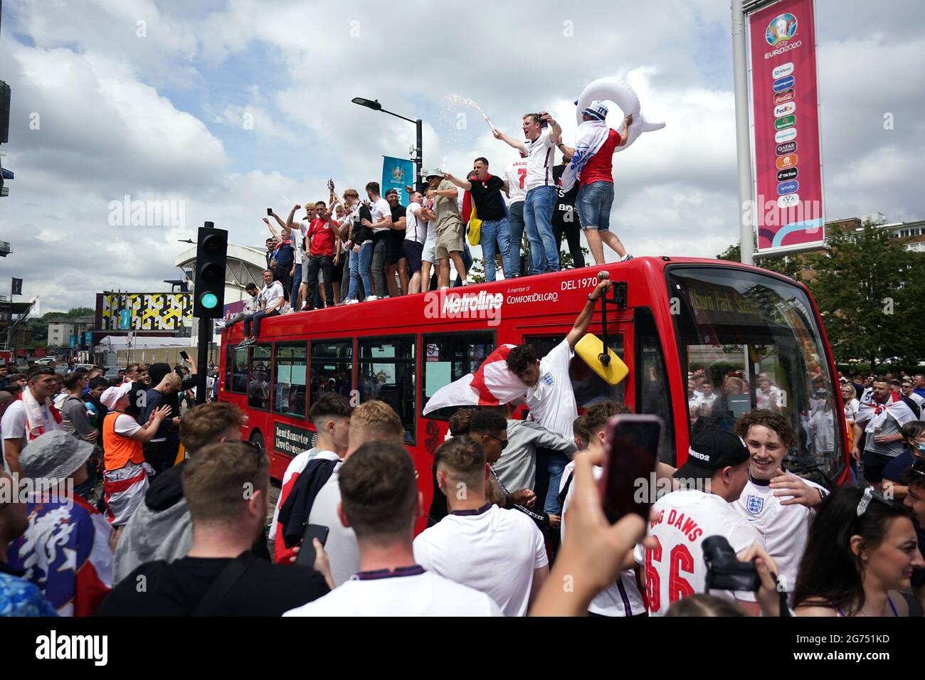 England fans climb aboard a bus outside the ground ahead of the UEFA ...