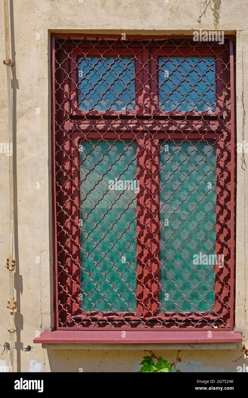 Old window with bars building safety protection Stock Photo - Alamy