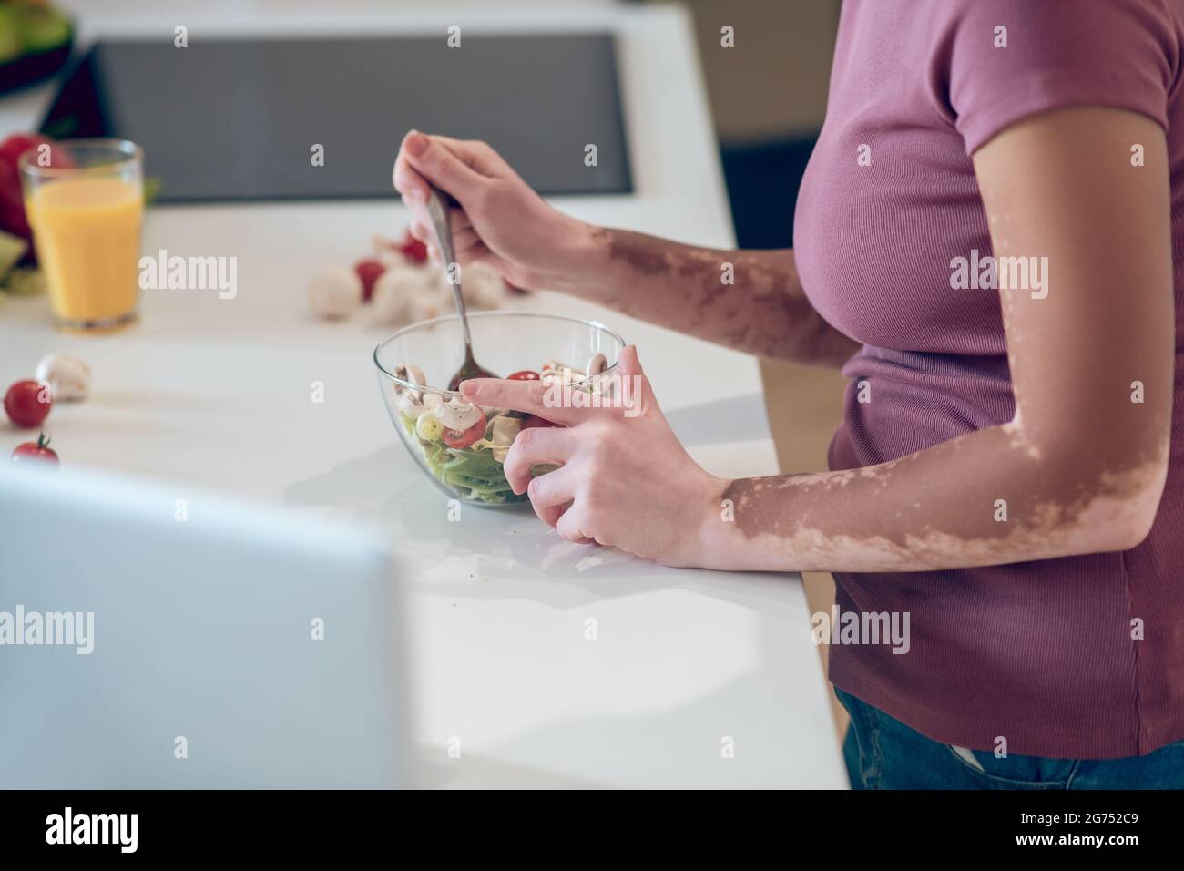 This is a woman eating something hi-res stock photography and images ...