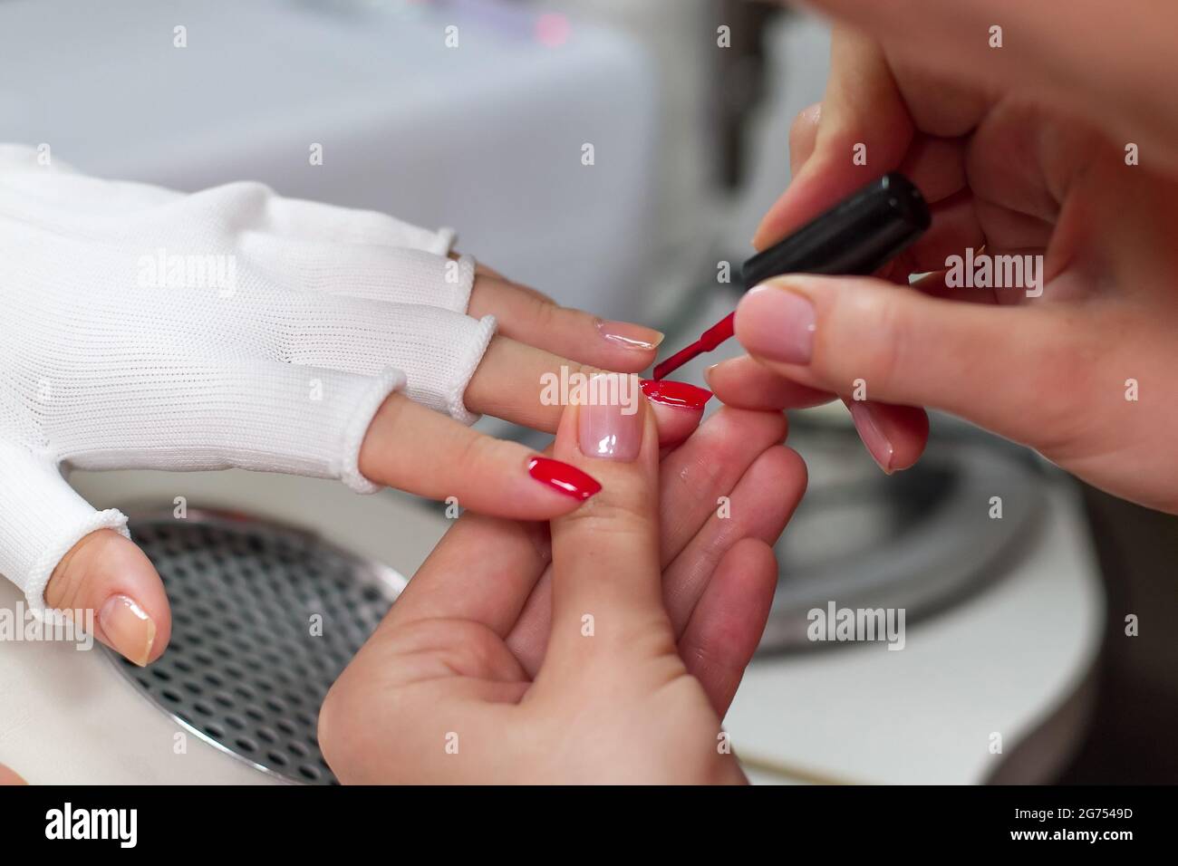 A female getting a manicure at a beauty salon Stock Photo - Alamy
