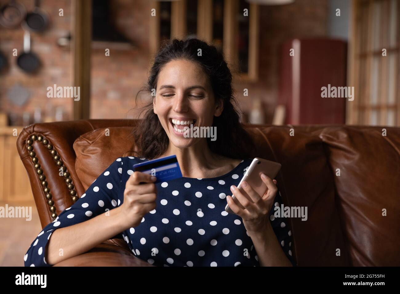Excited woman shopping on hi-res stock photography and images - Alamy