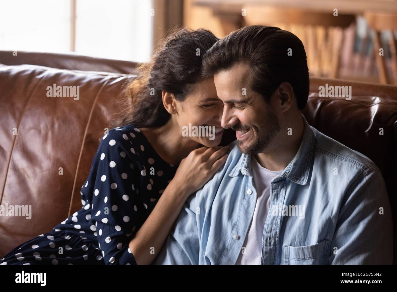 Happy millennial couple enjoying being together in new house Stock ...