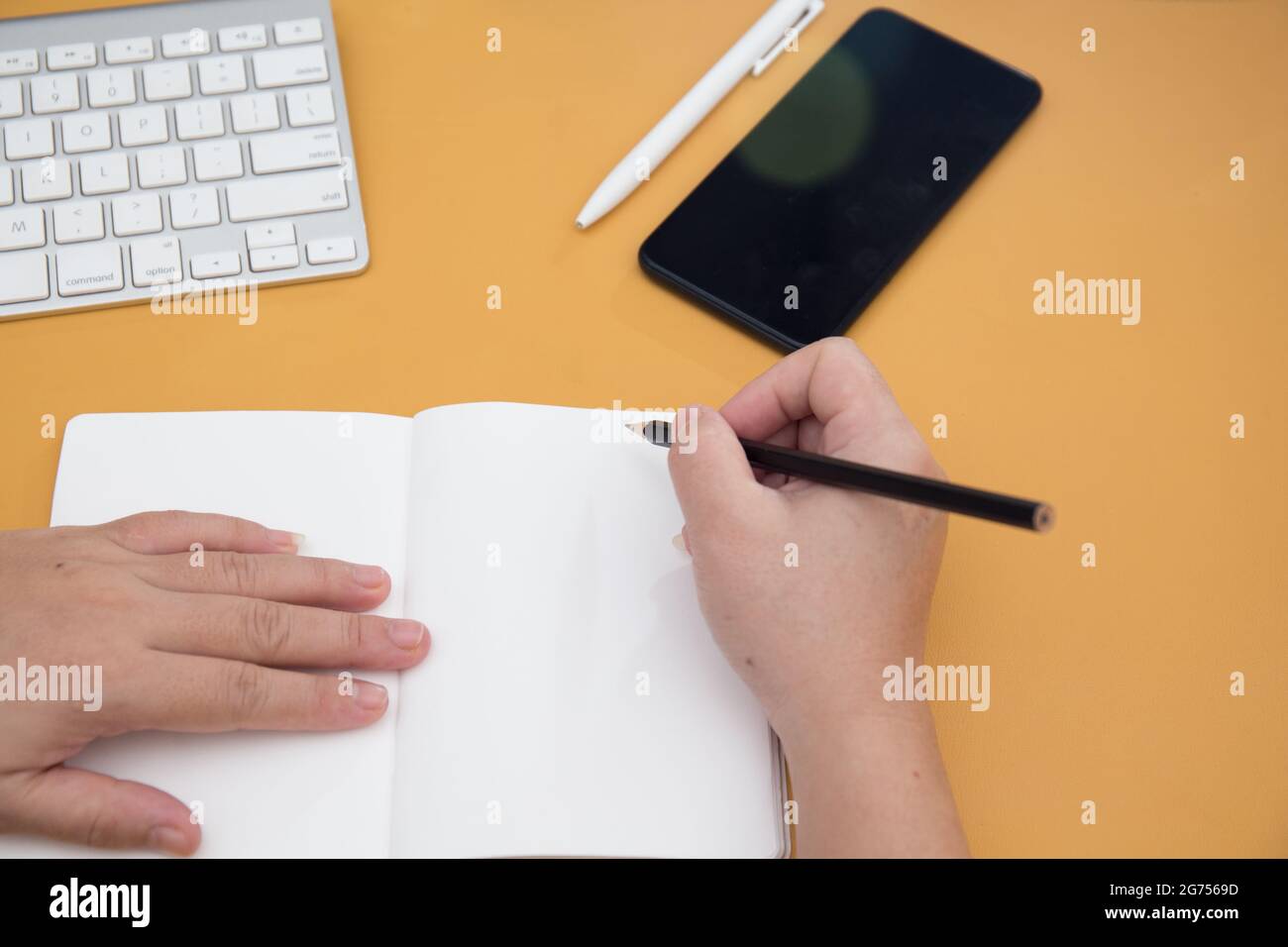 Overhead shot female writing hi-res stock photography and images - Alamy