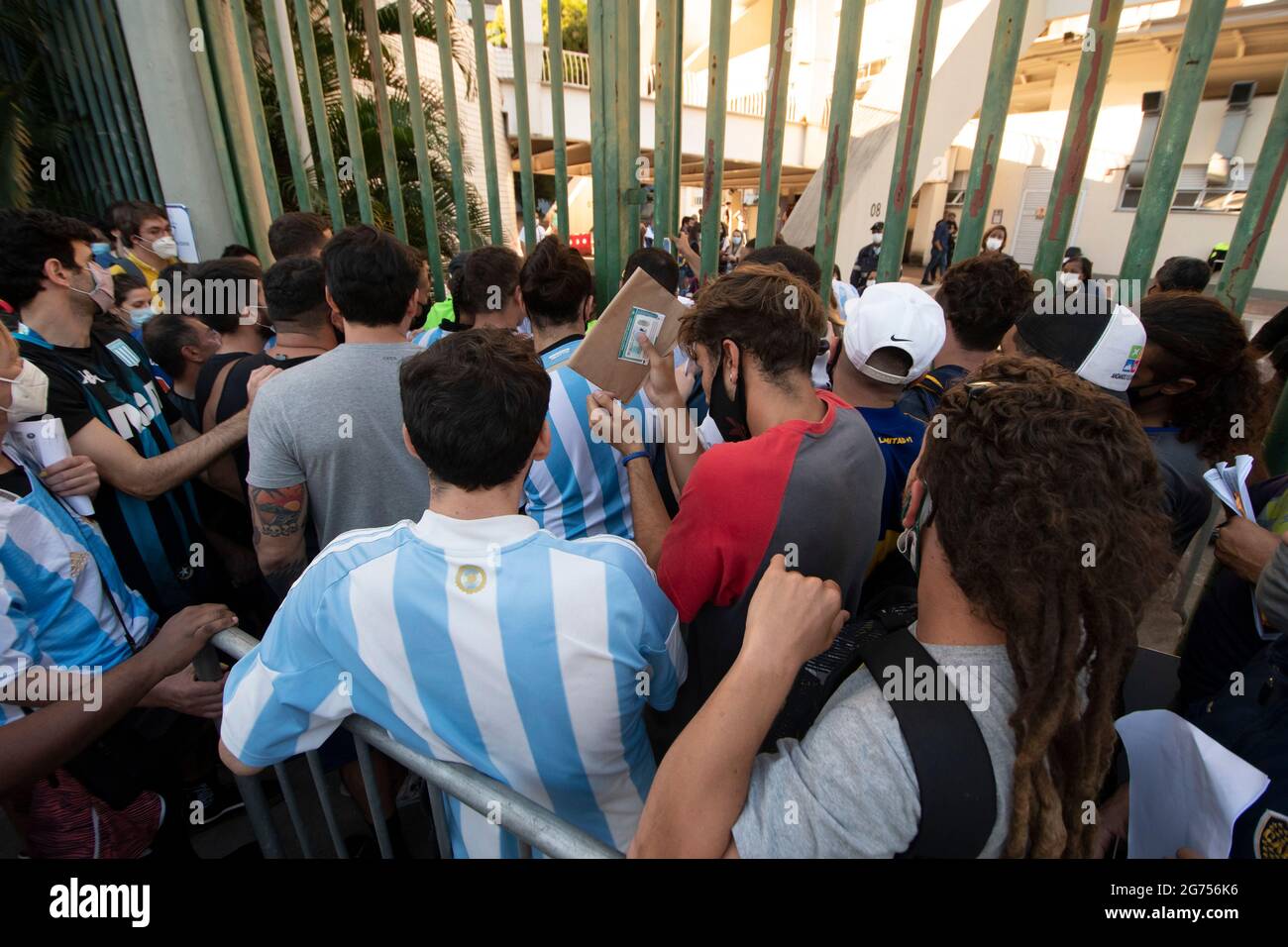 Rio, Brazil - july 10, 2021: fans crowd to exchange credentials for the ...