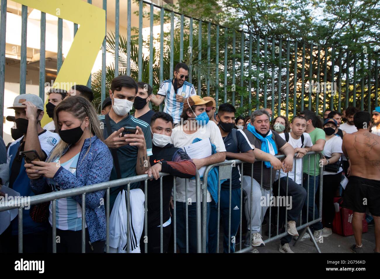 Rio, Brazil - july 10, 2021: fans crowd to exchange credentials for the ...
