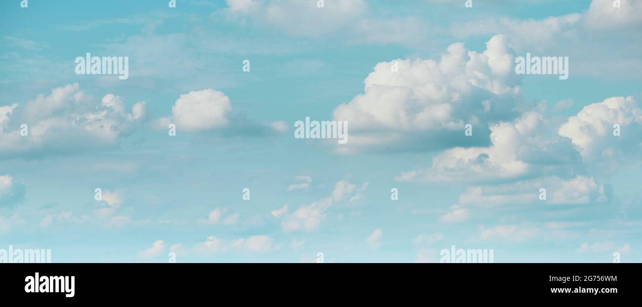 bright blue cloudy sky web banner for any text Stock Photo - Alamy