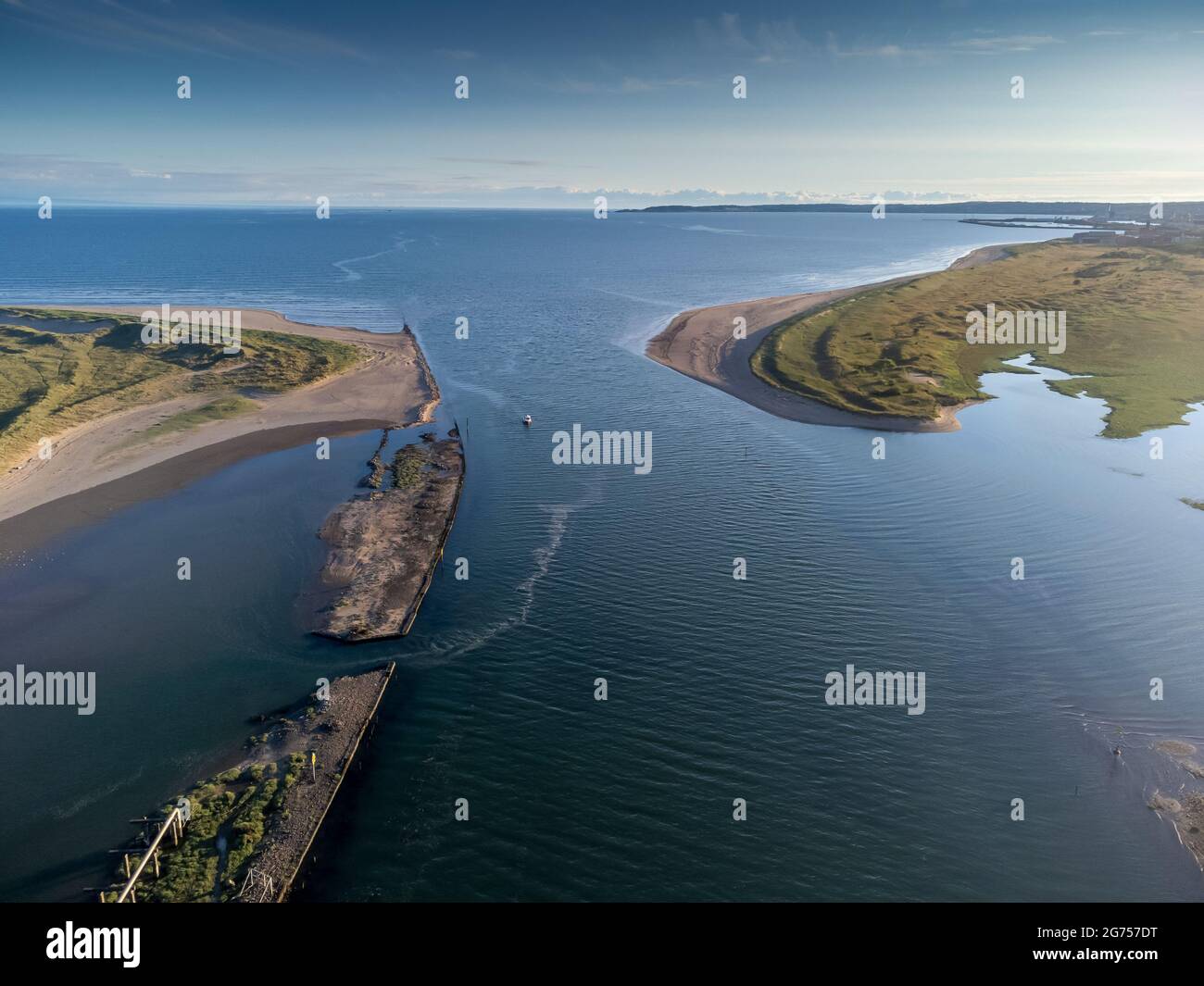 The mouth of the river Neath as it merges into the Bristol Channel with ...