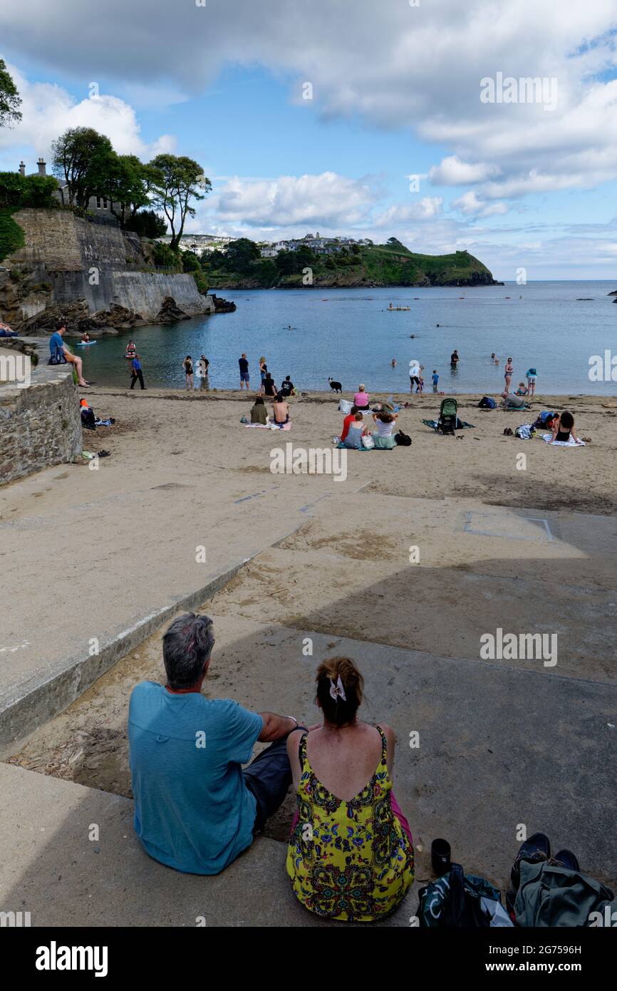 A lovely balmy afternoon relaxing on the beach at Readymoney Cove in ...