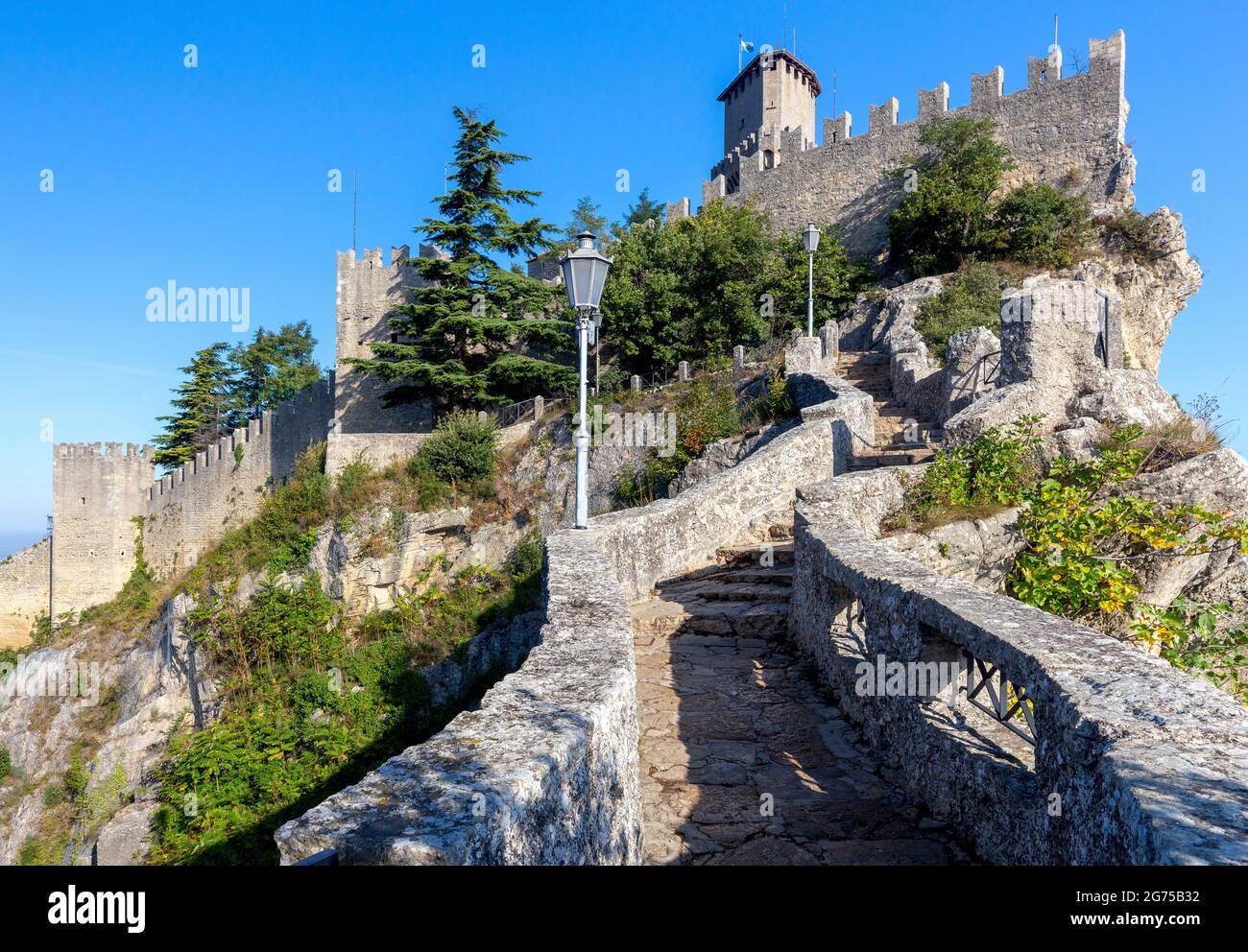 Scenic view of old medieval towers over the valley in the early morning ...