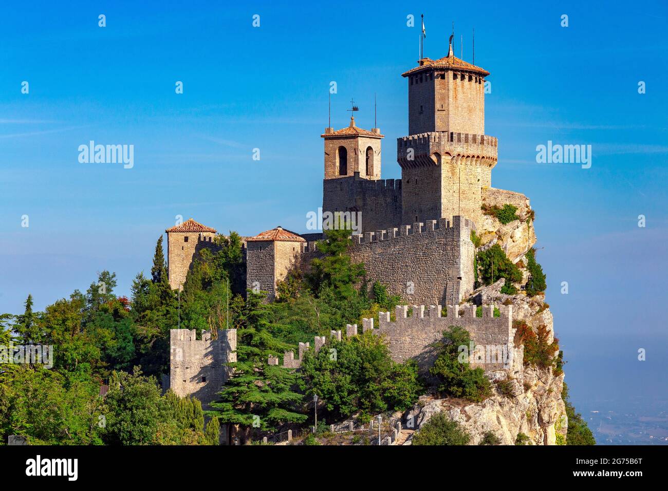 Scenic view of old medieval towers over the valley in the early morning ...