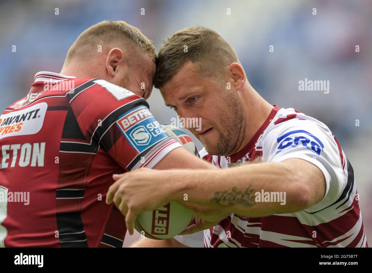 Tony Clubb (17) of Wigan Warriors during the warm up with Brad ...