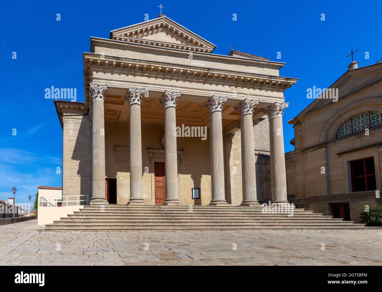Old stone square with a colonnade in San Marino Stock Photo - Alamy