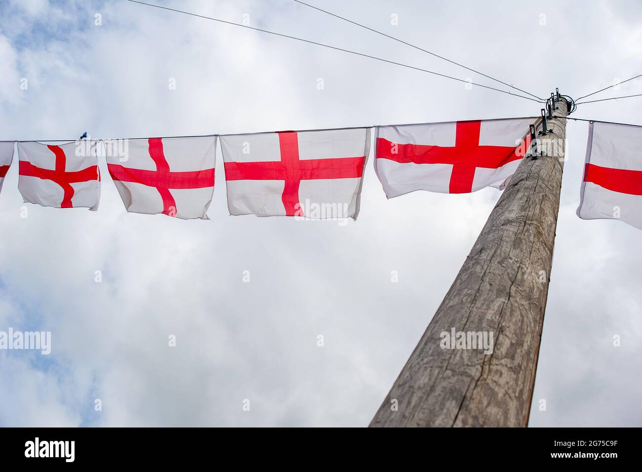 Slough, Berkshire, UK. 11th July, 2021. England flags and bunting hang ...