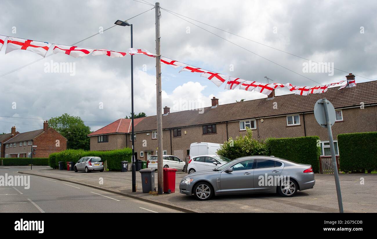 Slough, Berkshire, UK. 11th July, 2021. England flags and bunting hang ...