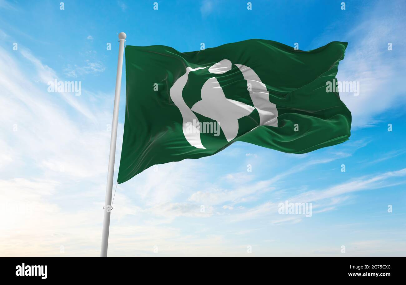 official city flag of Chiba, Chiba waving in the wind on flagpoles ...