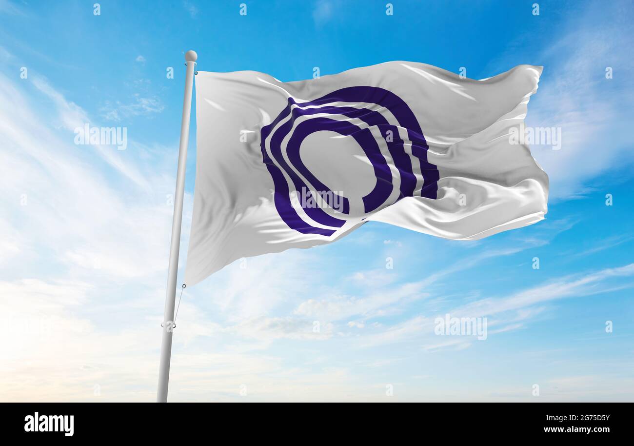 official city flag of Kawasaki, Kanagawa waving in the wind on ...