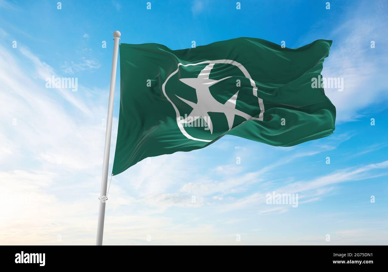 official city flag of Setagaya, Tokyo waving in the wind on flagpoles ...