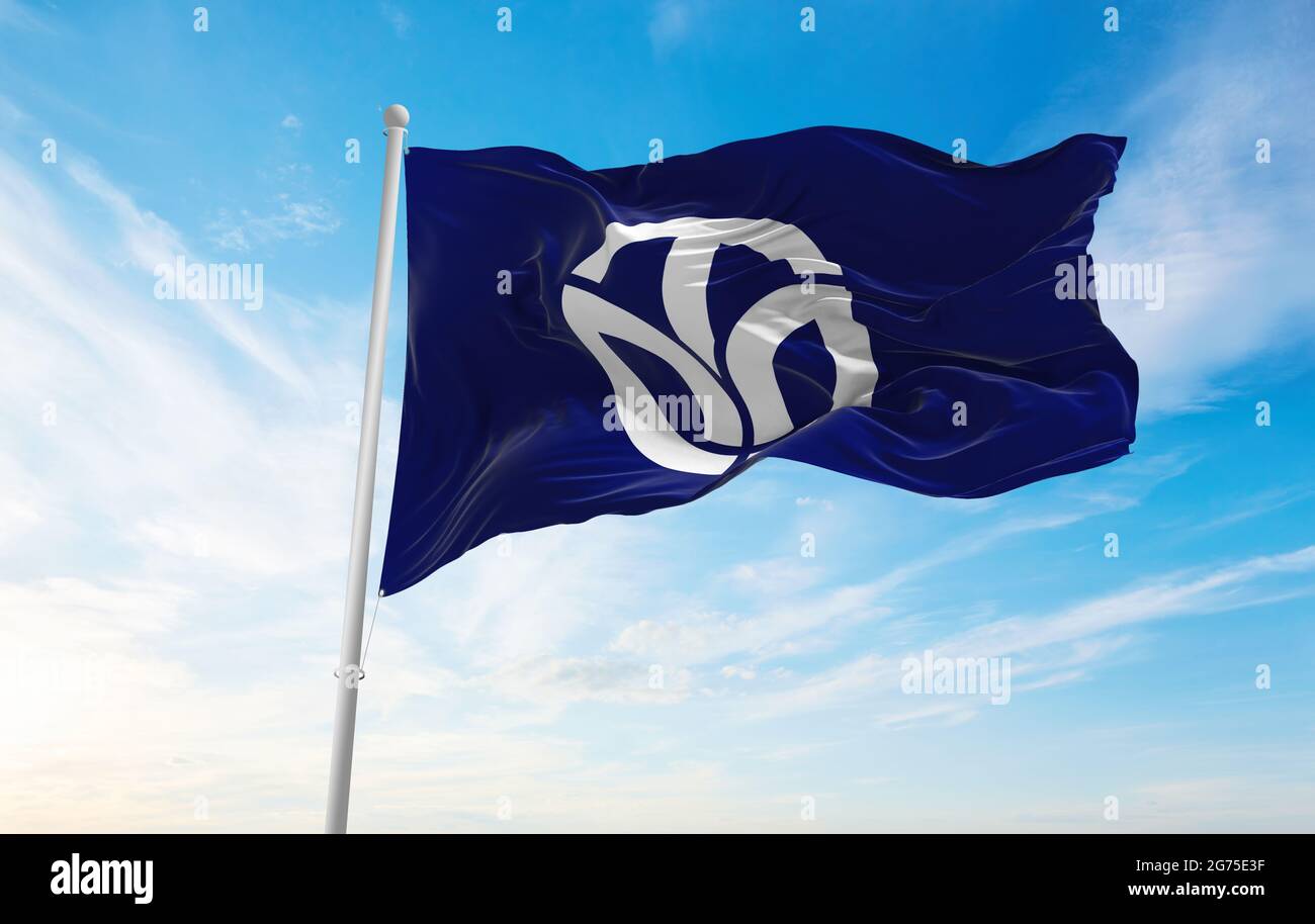 official flag of Fukui prefecture waving in the wind on flagpoles ...