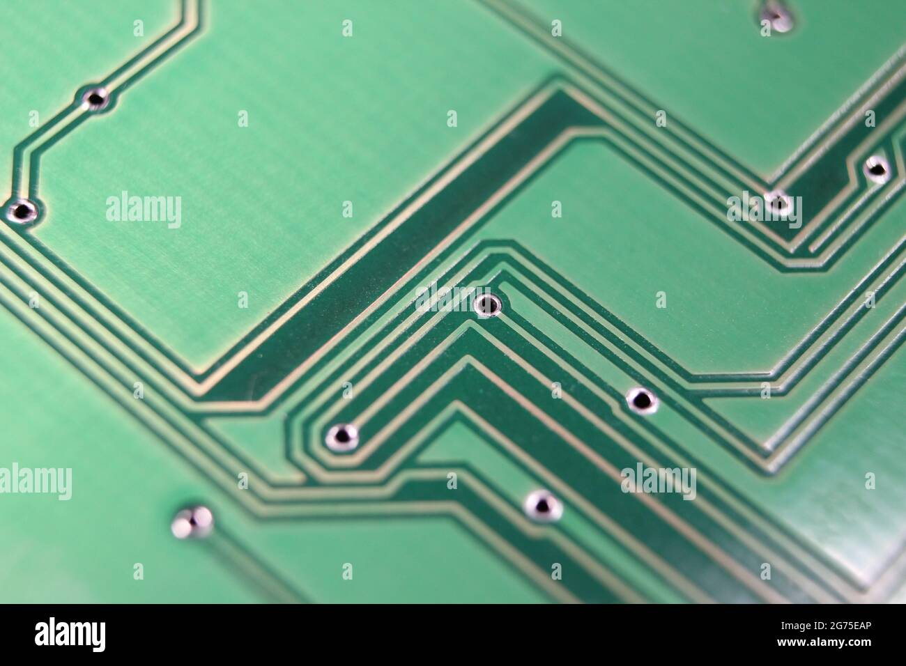 An electronic board with circuit lines and chip Stock Photo - Alamy